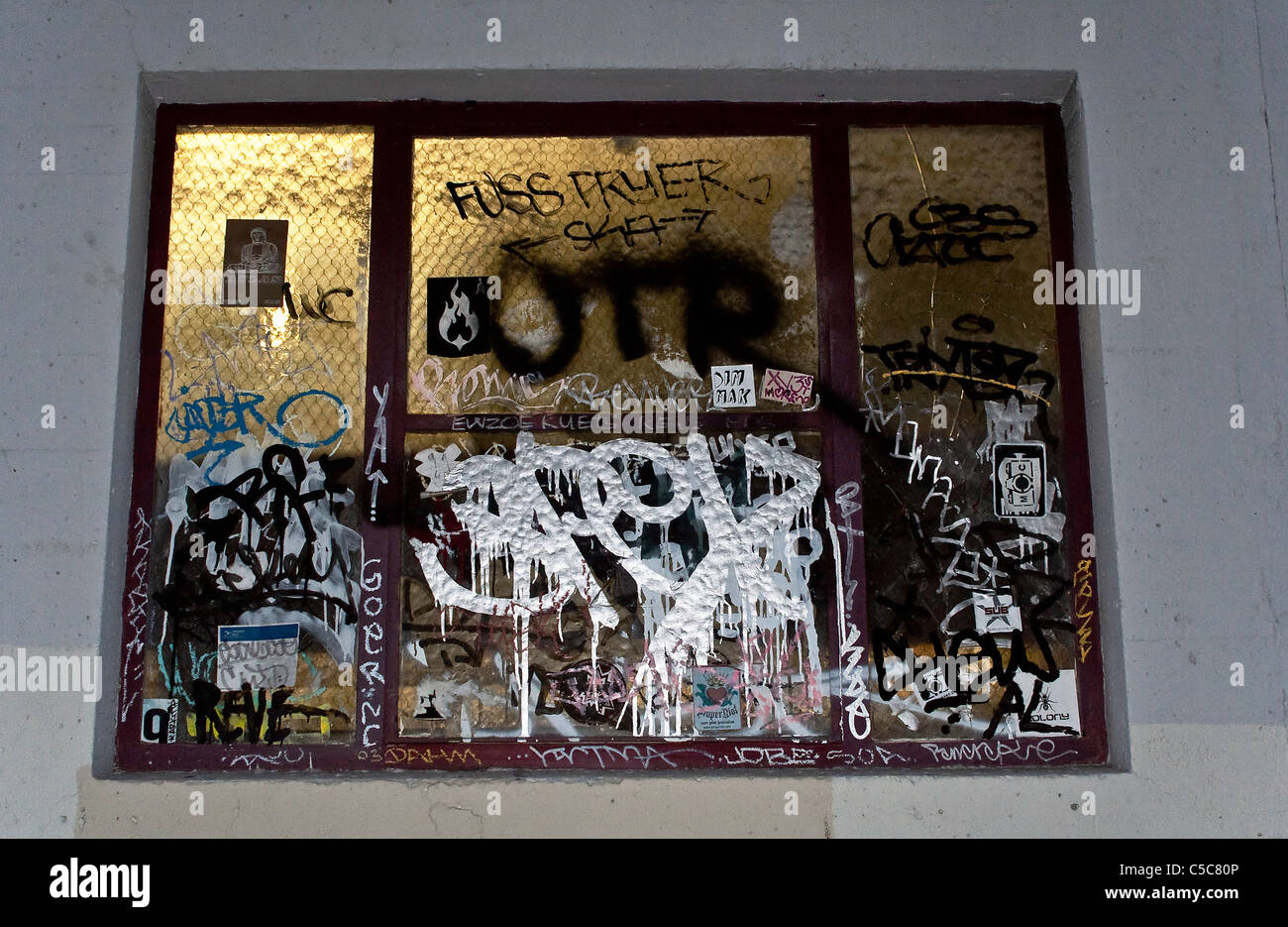 Graffiti on window Stock Photo - Alamy