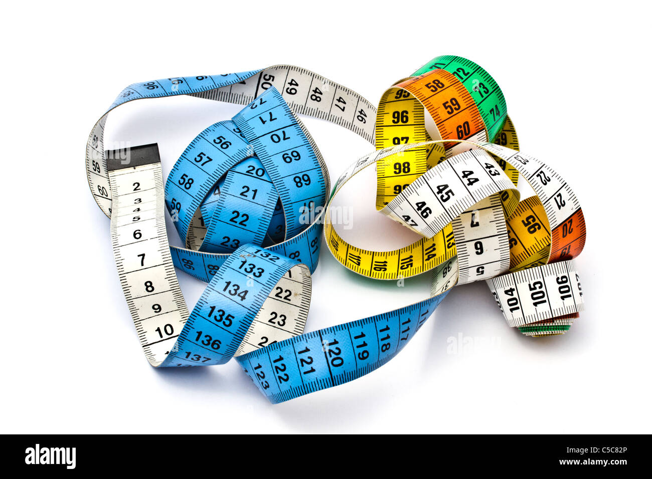 Yellow spiral tape measure hi-res stock photography and images - Alamy