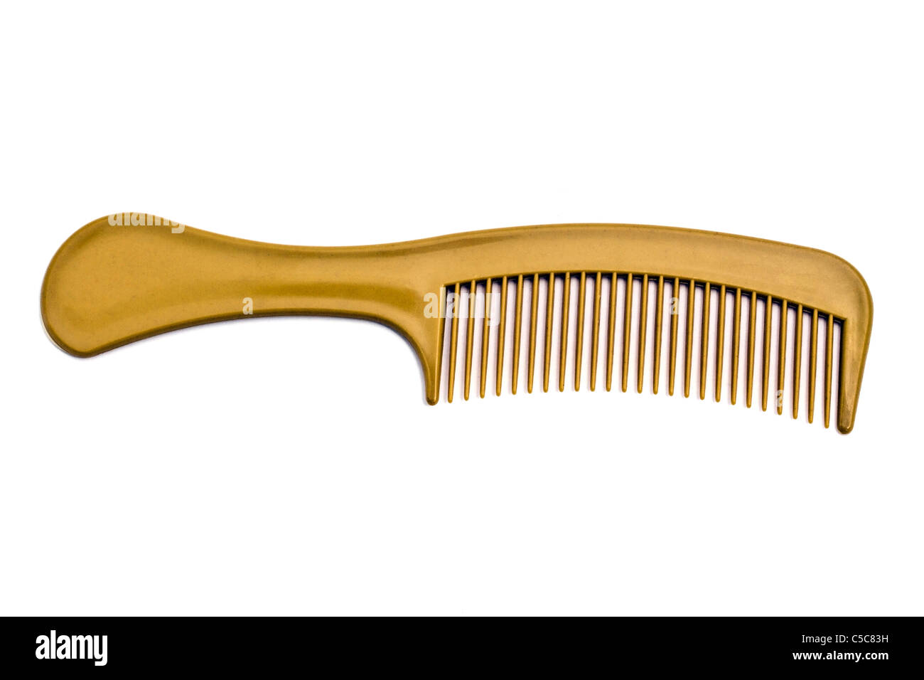 Yellow comb isolated on white background Stock Photo - Alamy