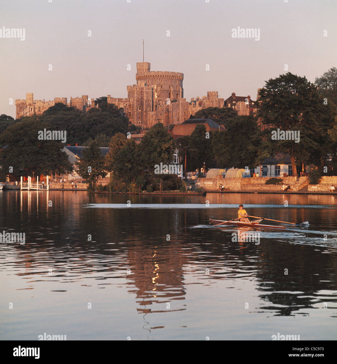 Windsor Castle in the evening sun across River Thames, England, Britain ...