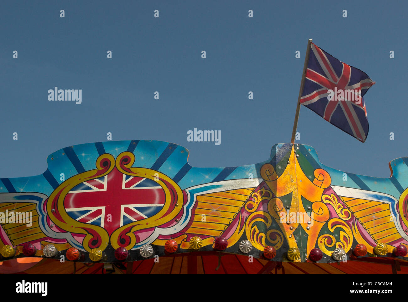 Union Jack decorations on a fun fair ride Stock Photo - Alamy
