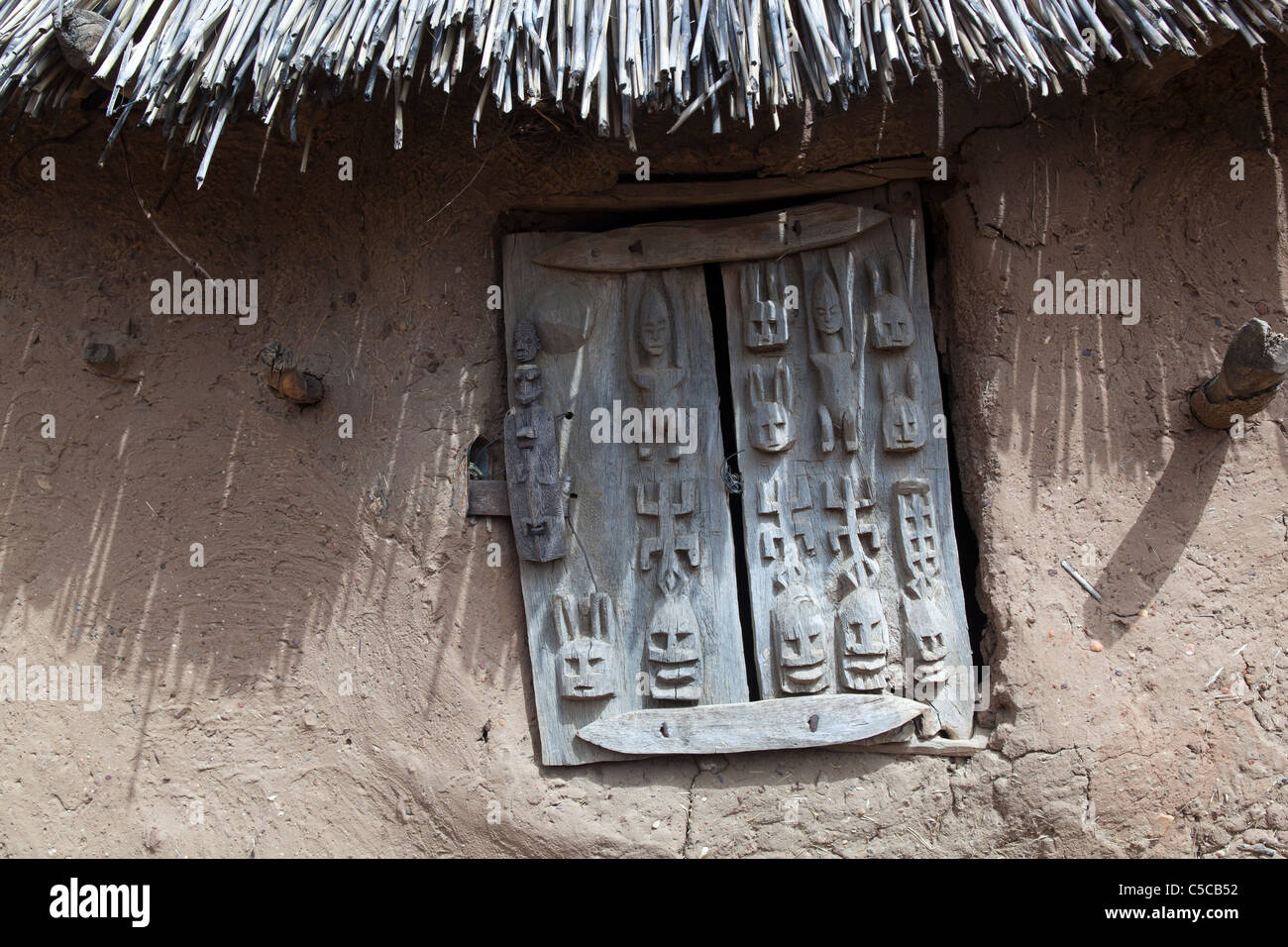 A dogon door on a granary hut in aye dogon Mali West Africa Stock Photo ...