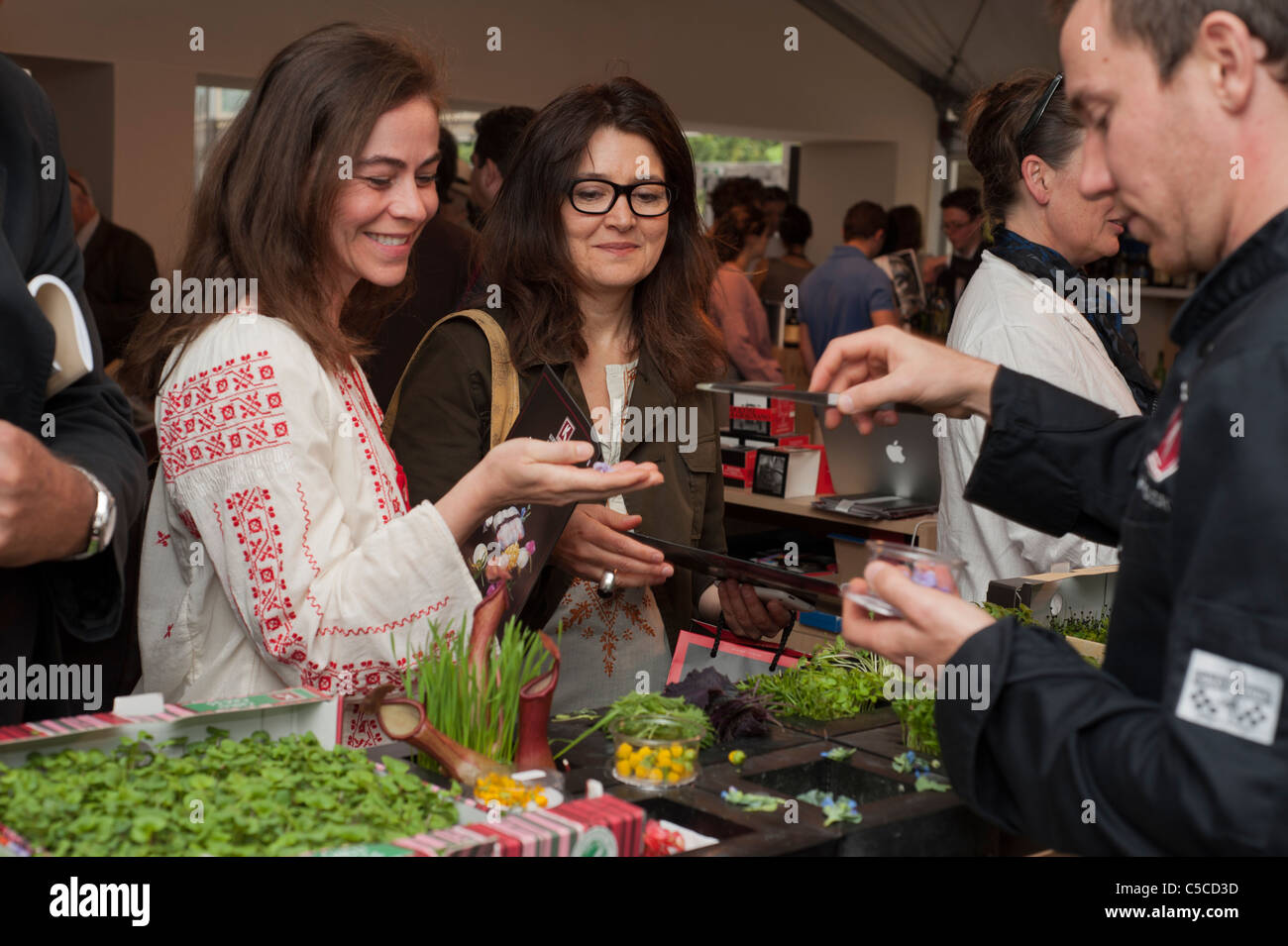 Paris, France, Women Test Tasting Food Samples at Food and Fashion ...