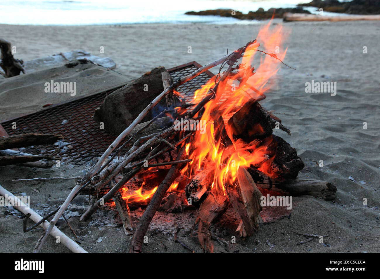 Early evening beach fire hi-res stock photography and images - Alamy