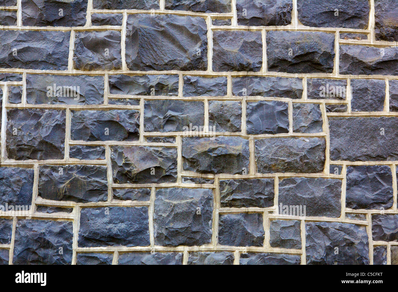 Blue hued rectangular shaped stone wall Stock Photo - Alamy