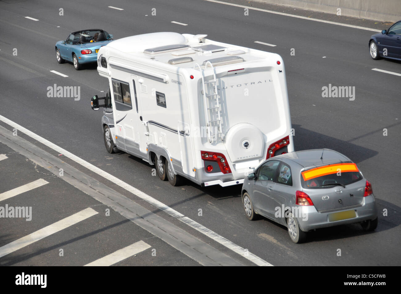 View from above looking down on roof side & back of RV camper van ...