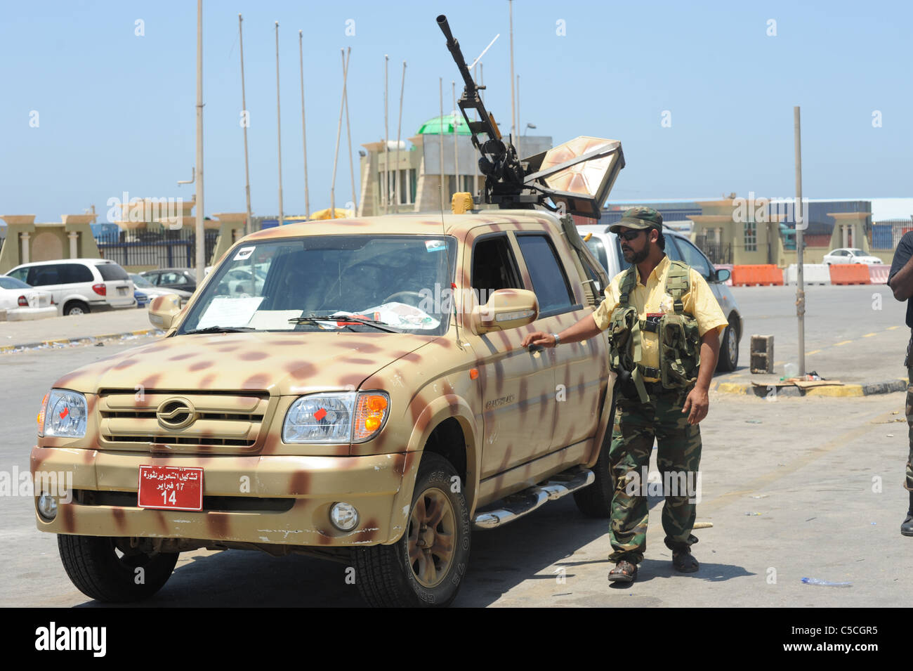 a war between Gaddafi army and Libya's Transitional National Council army with air support from ...