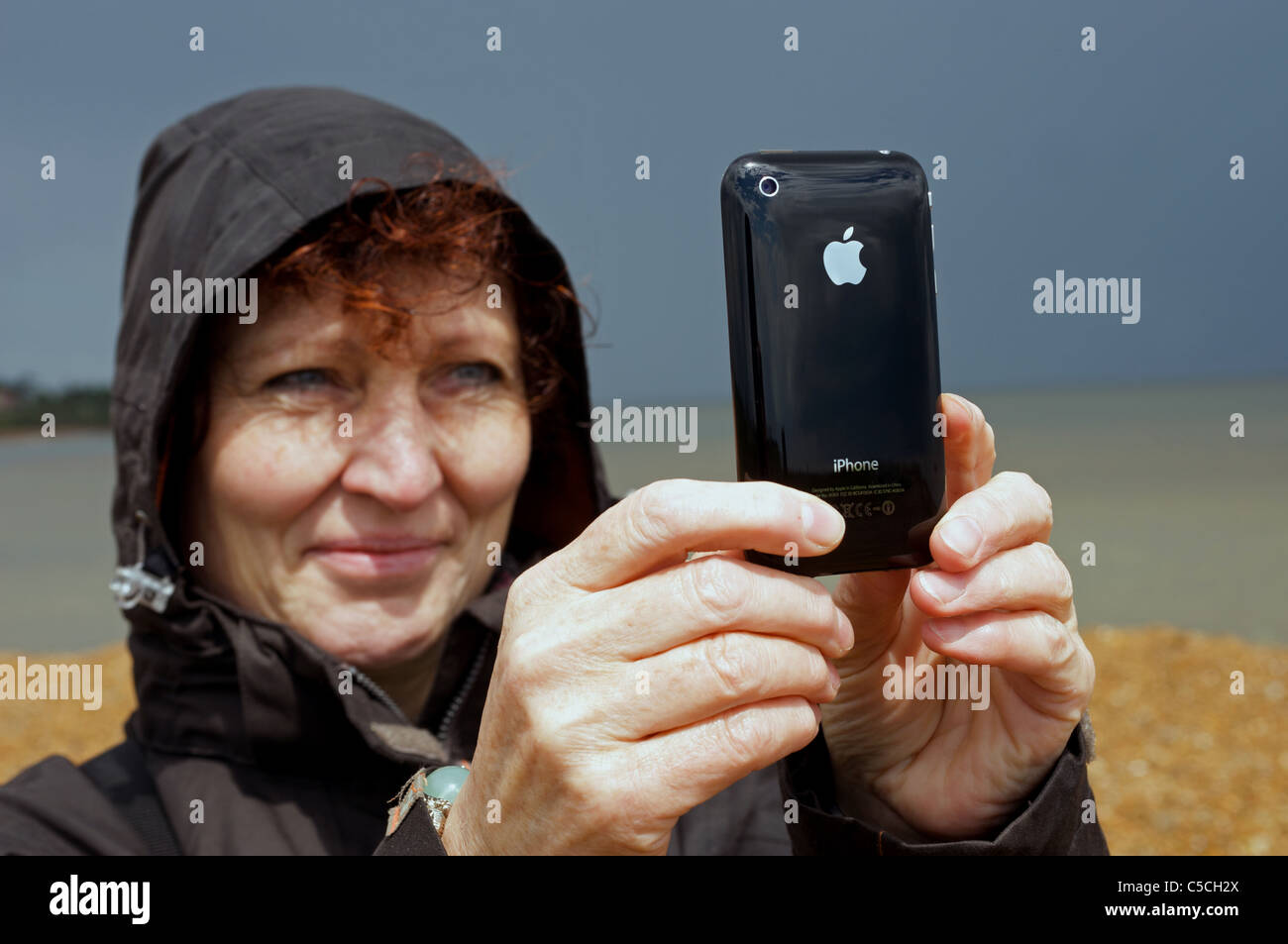 Using a camera uk hi-res stock photography and images - Alamy