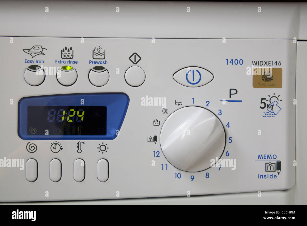 Controls of automatic washing machine programmed to wash on the easy ...