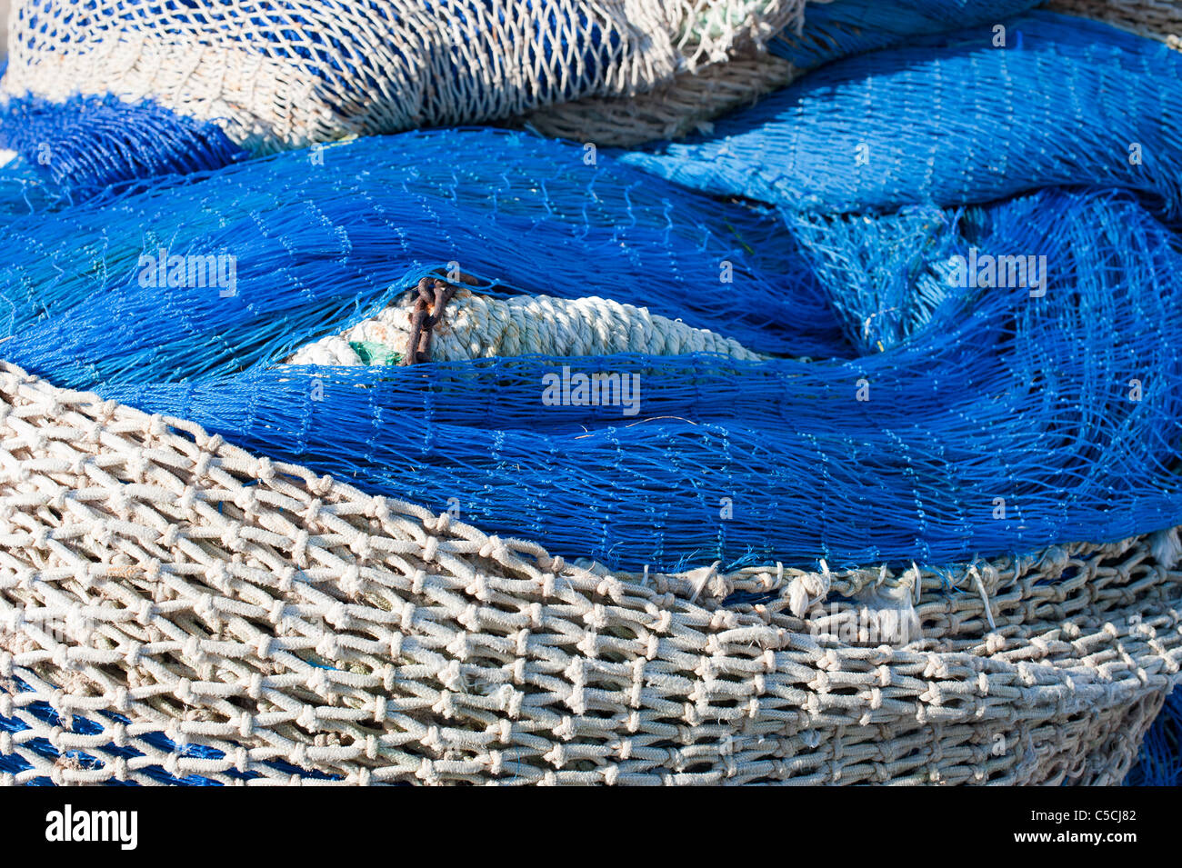 Closeup of a stack of traditional fishing nets Stock Photo - Alamy