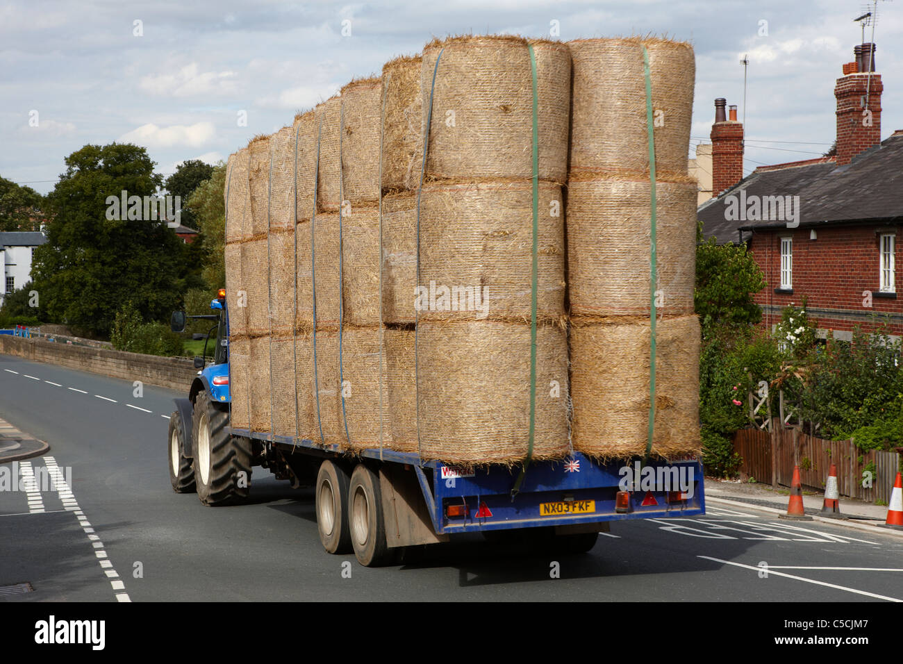 freshly baled round hay bales on tractor Stock Photo - Alamy