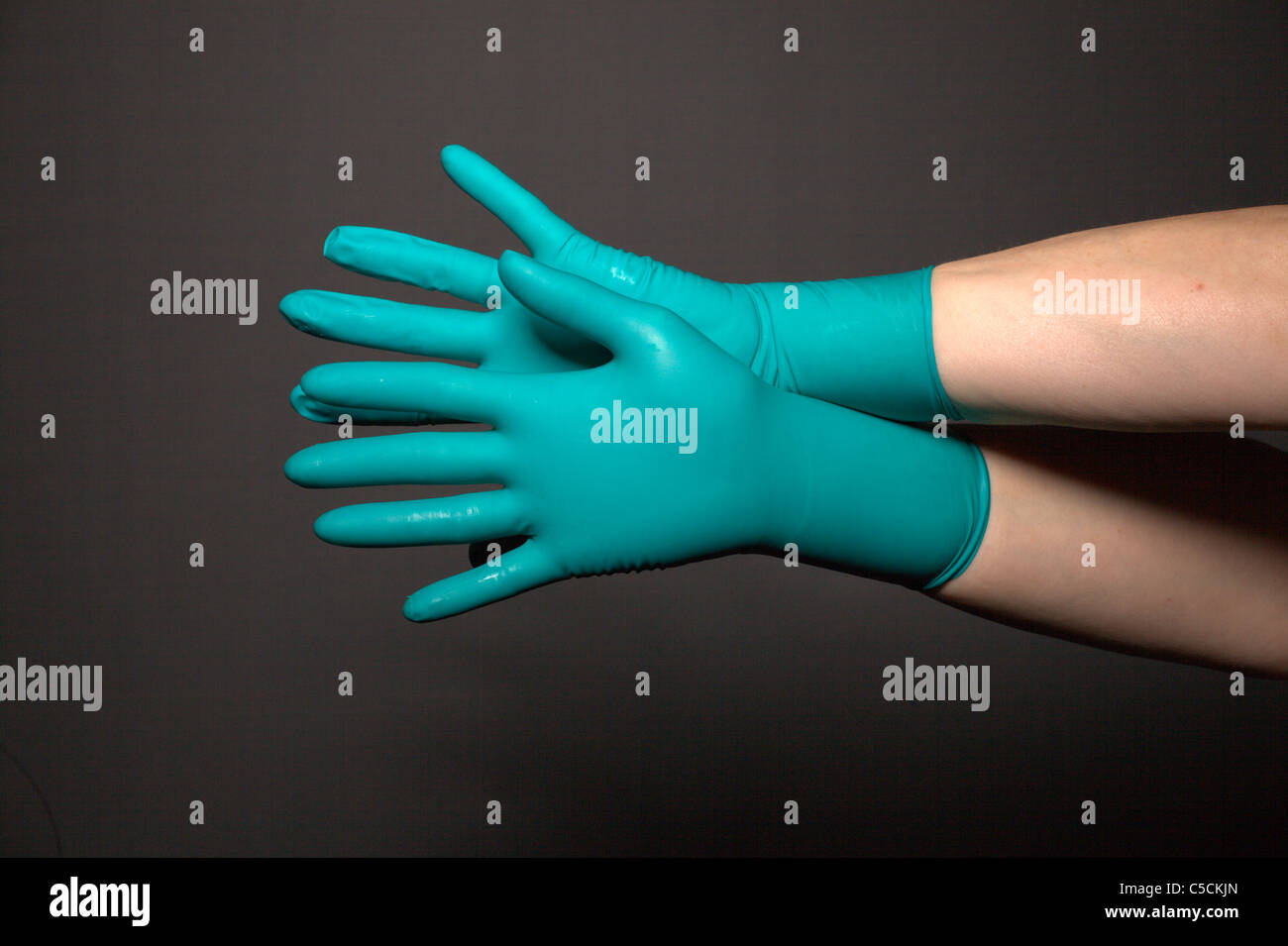 doctors gloved hands Stock Photo - Alamy