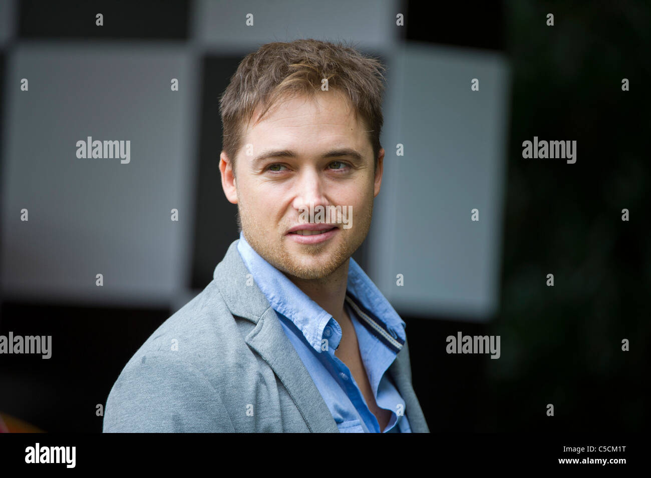 Marcus Patrick attends the UK premiere of CARS 2 at Empire Leicester ...