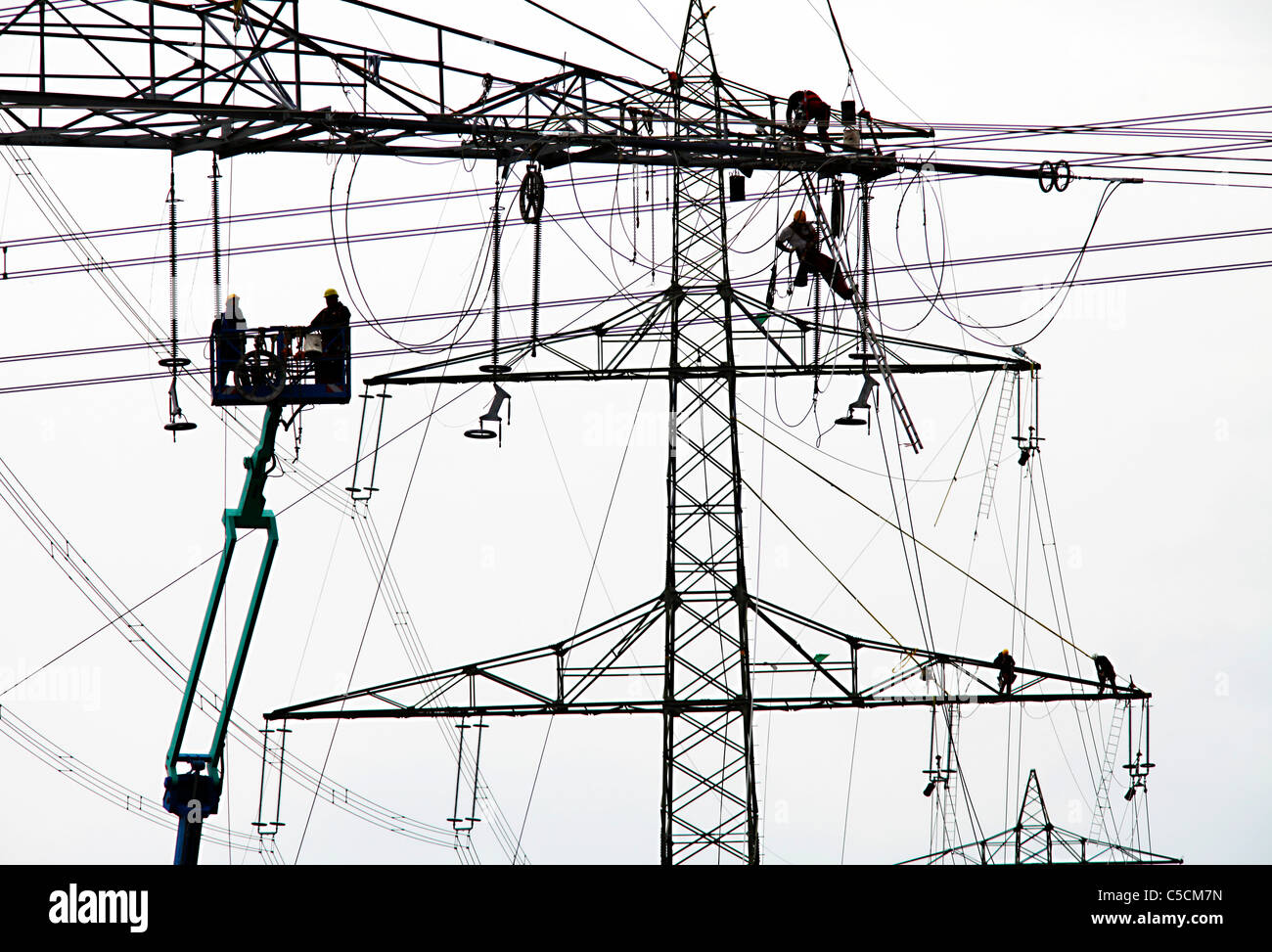 Construction of new High-voltage power lines. New electricity pylons ...