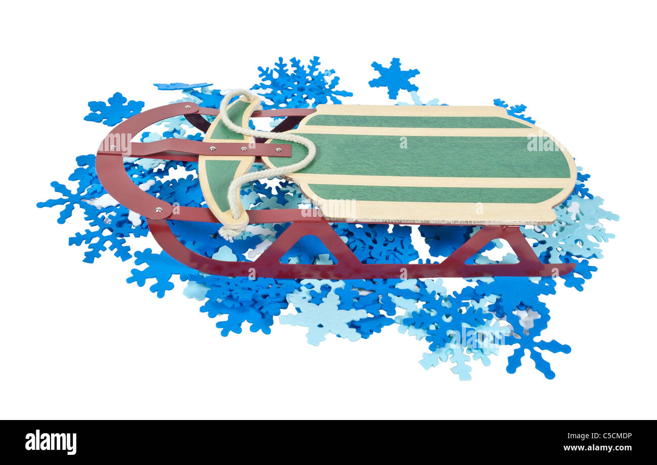 Snow sled with metal runners for sliding downhill on a bed of colorful ...