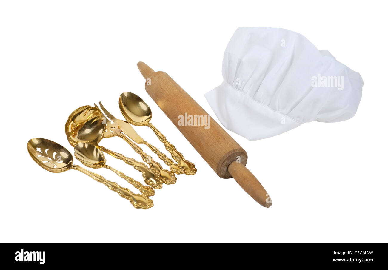 White chef Toque Blanche hat with a wooden rolling pin and goldware ...