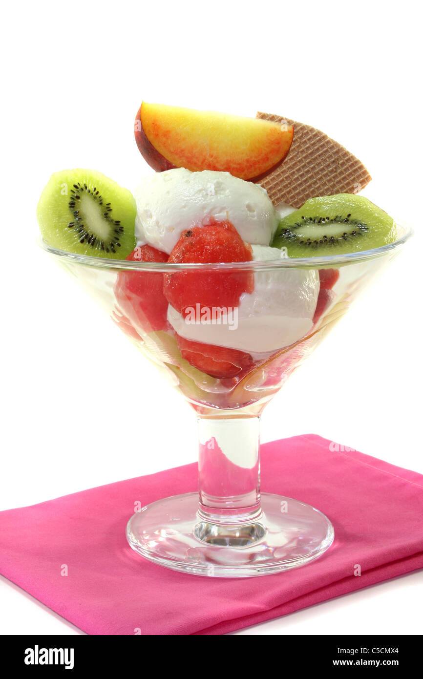 Fruit sundae with fresh kiwi, peach and melon Stock Photo - Alamy