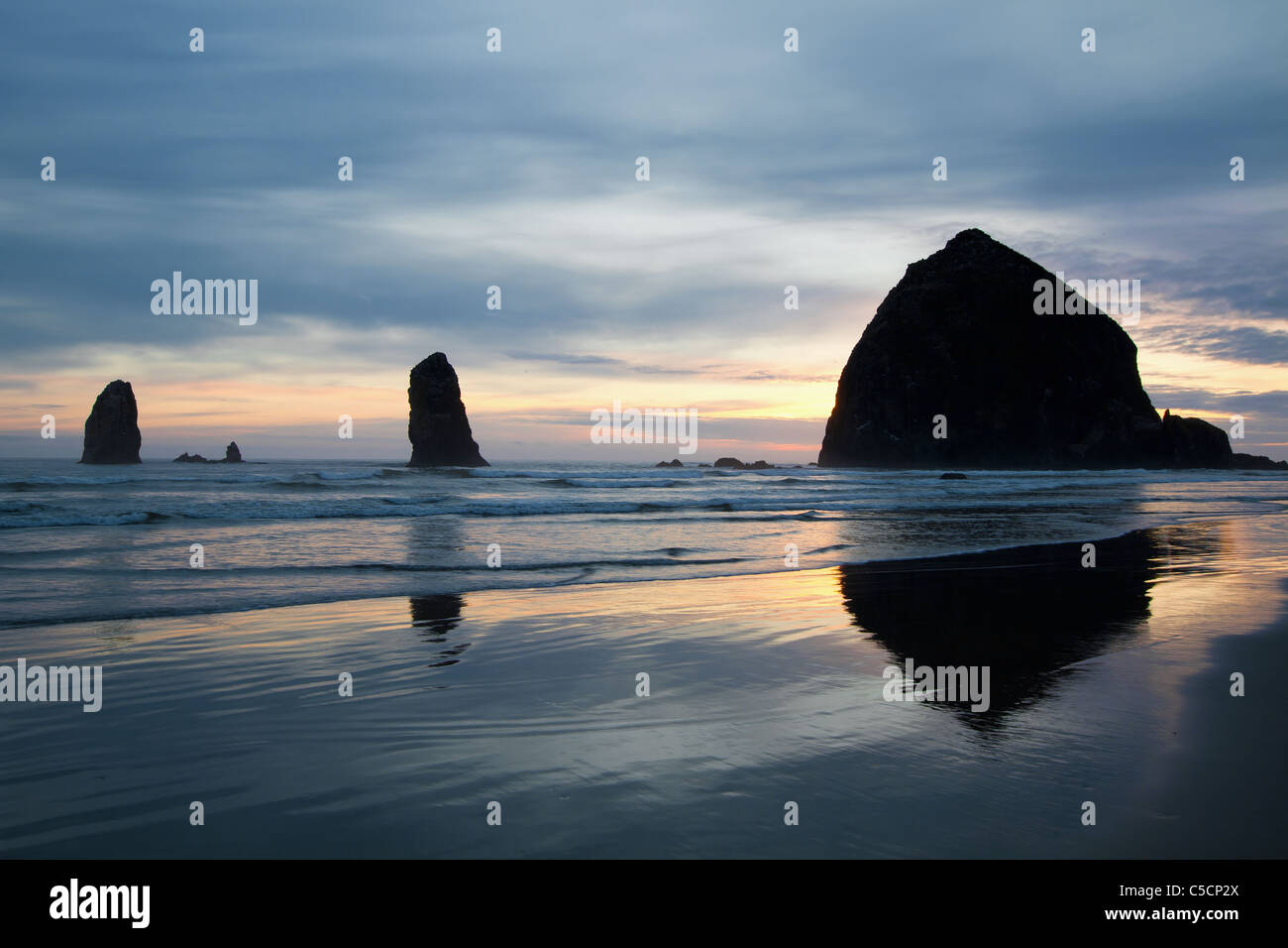 Haystack Rock and the Needles on Cannon Beach at Oregon Coast Stock ...