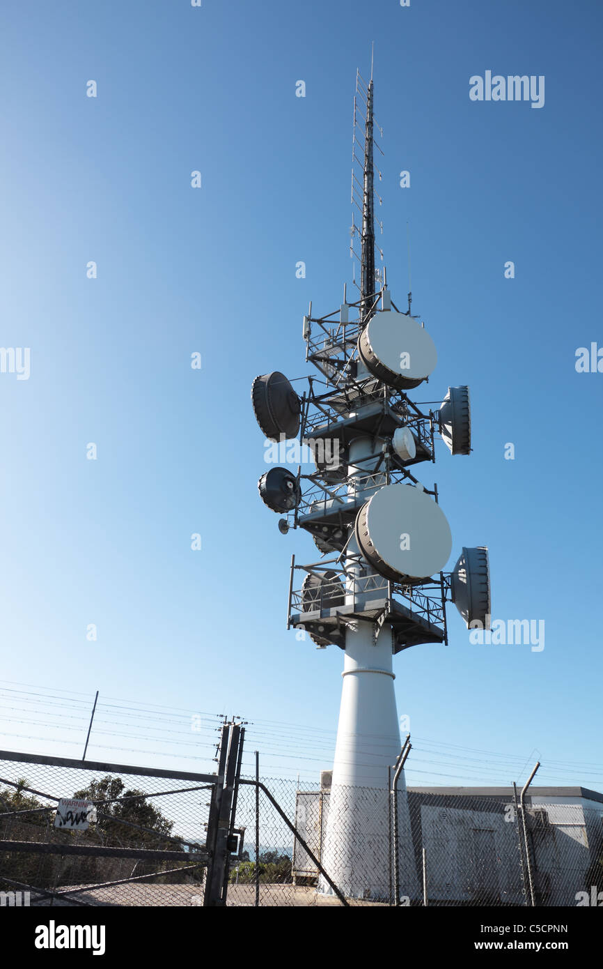 Communications Tower with Security Fence Stock Photo - Alamy