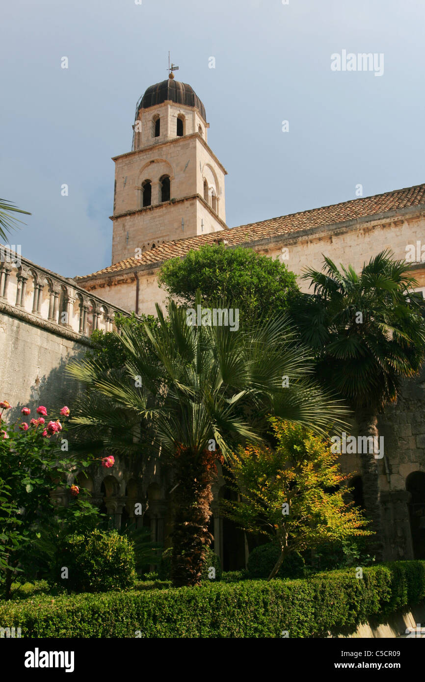 The cloister garden and the bell tower of the Franciscan Monastery ...