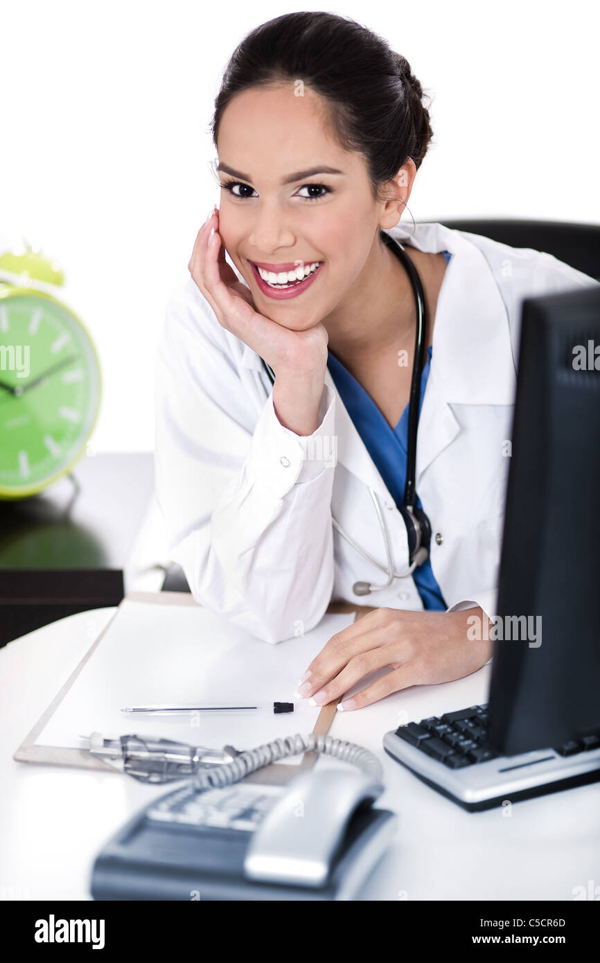 Doctor smiling at the camera over white background Stock Photo - Alamy