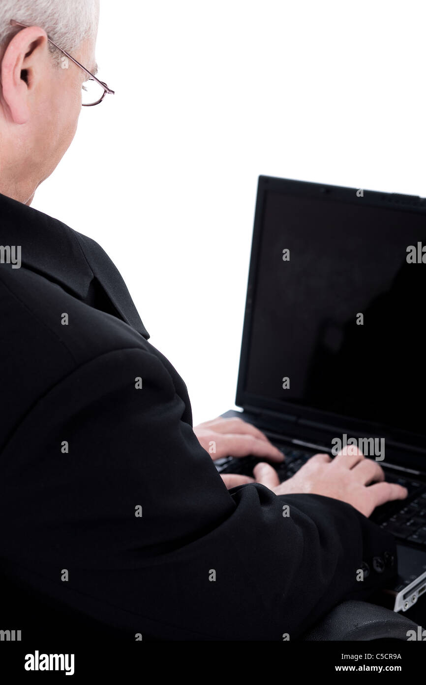Rear view of business man working in laptop on white background Stock ...