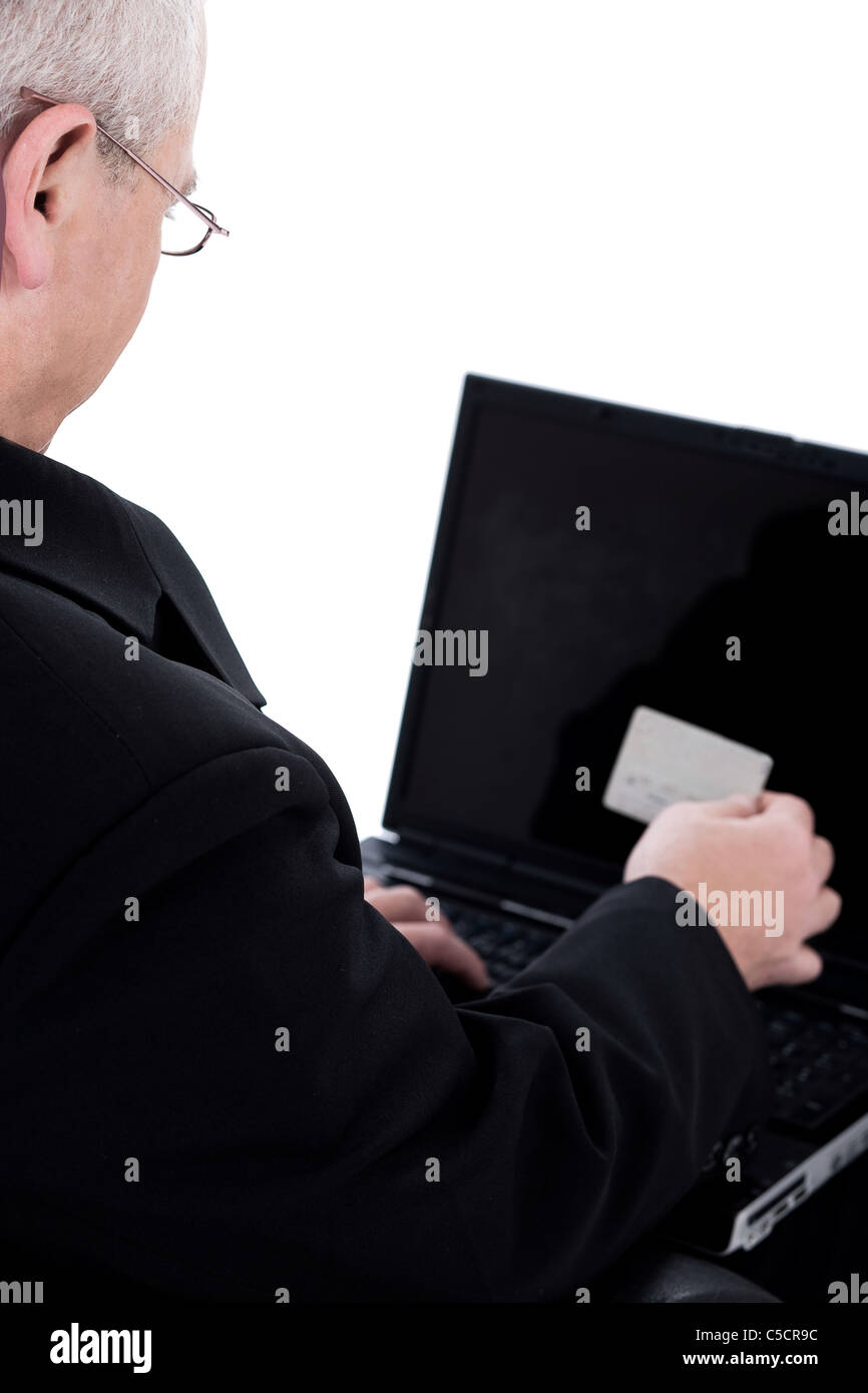 Senior person looking into his swipe card rear view over white ...