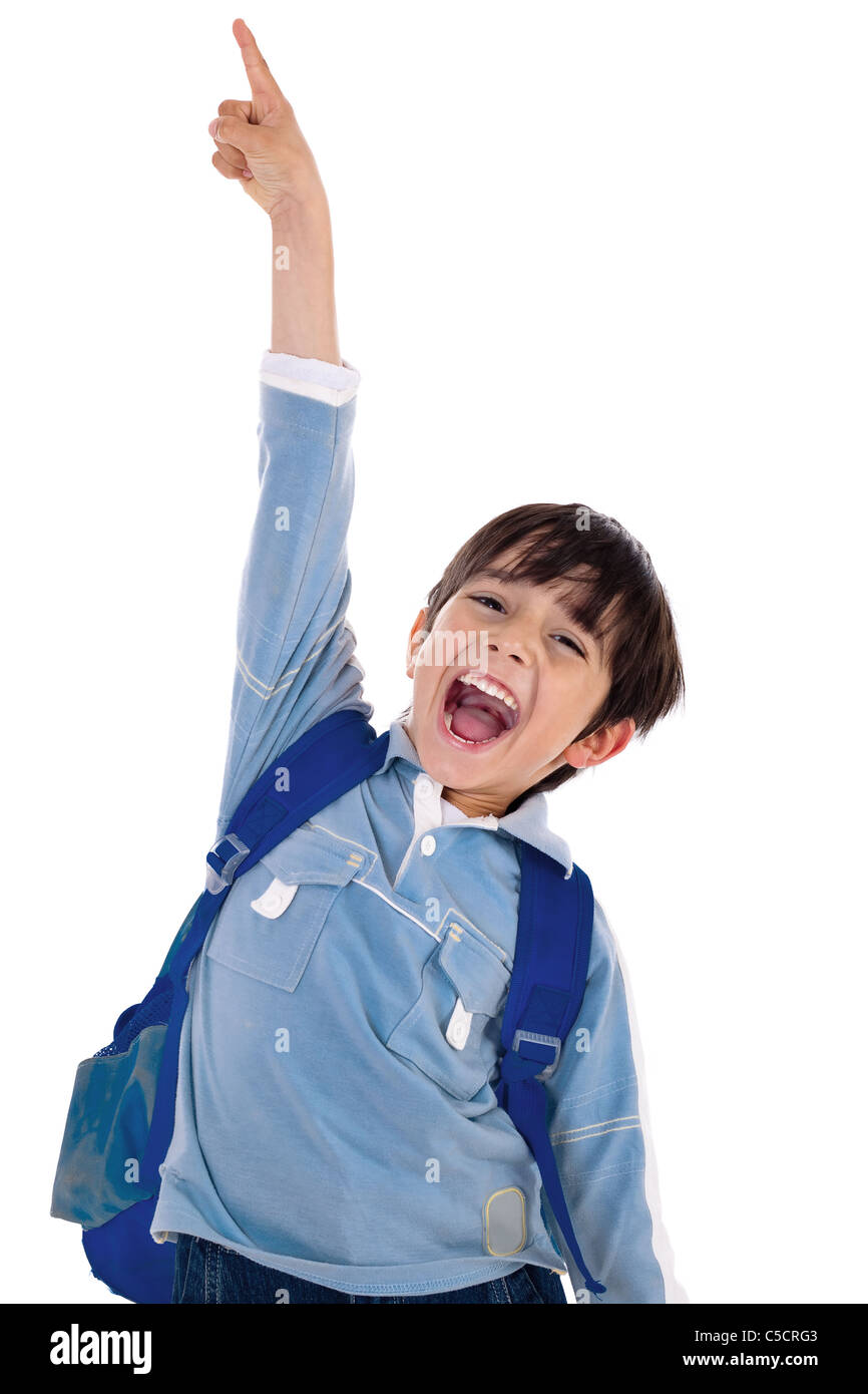 Young school boy excitingly shouts and raise his hand up on isolated ...