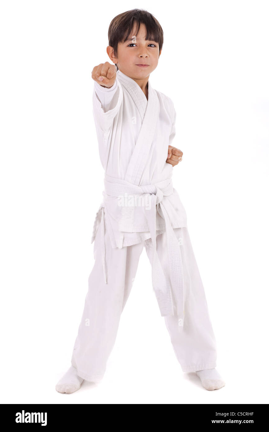 Small karate boy in training isolated white background Stock Photo - Alamy