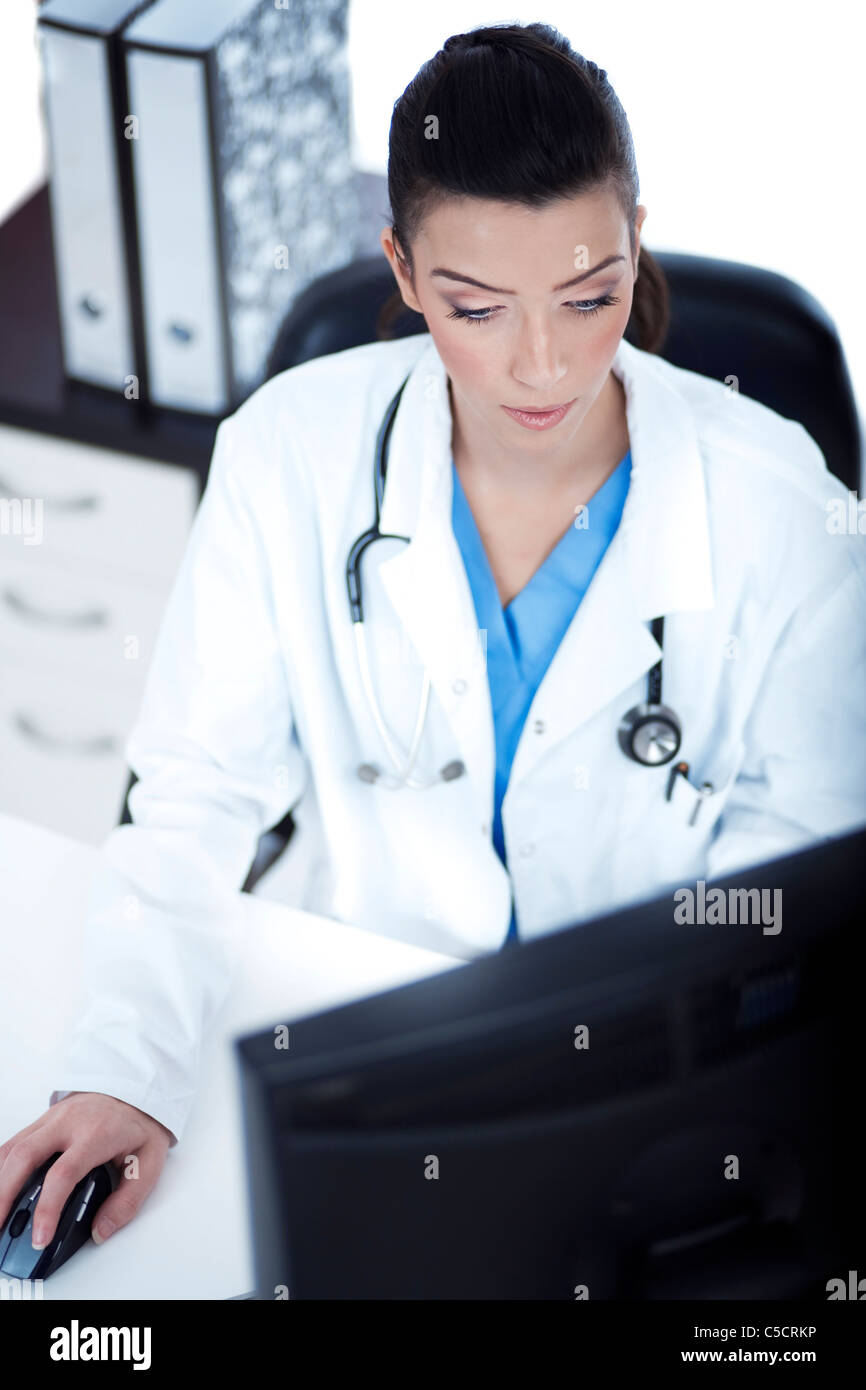 Top angle of the young doctor at her room over white background Stock ...