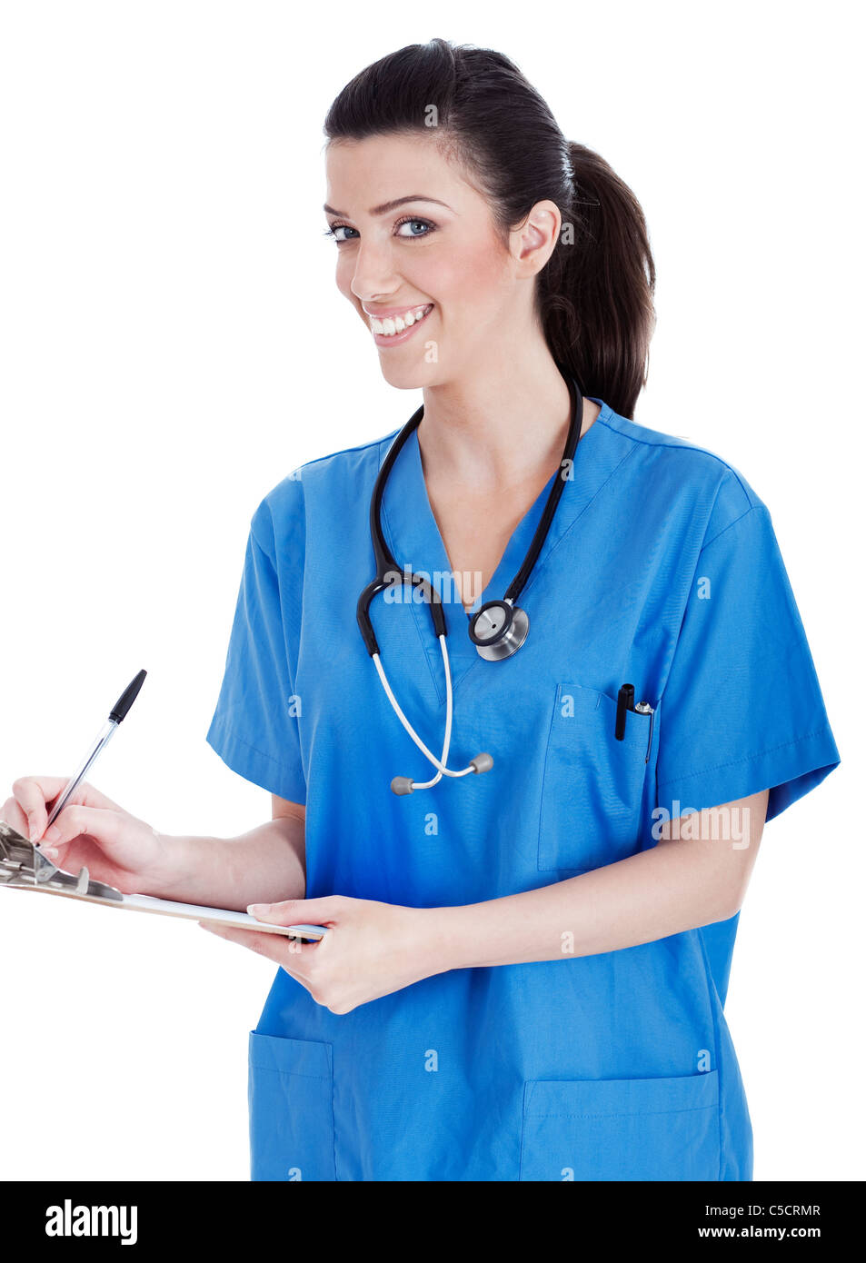 Smiling cute nurse making her medical notes over white background Stock ...
