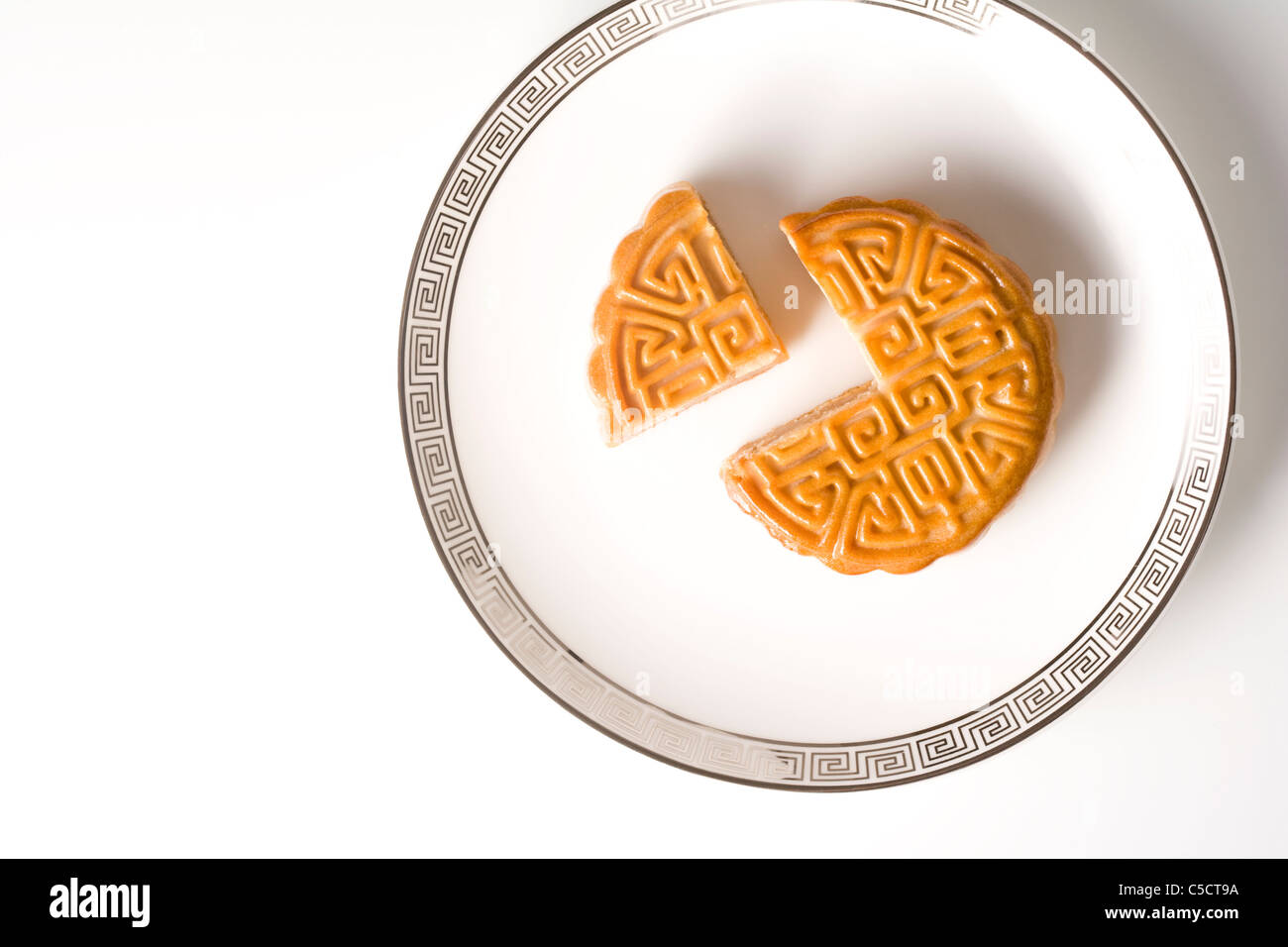 Mid-Autumn Festival Moon Cake, Cut and Presented on Plate Stock Photo ...