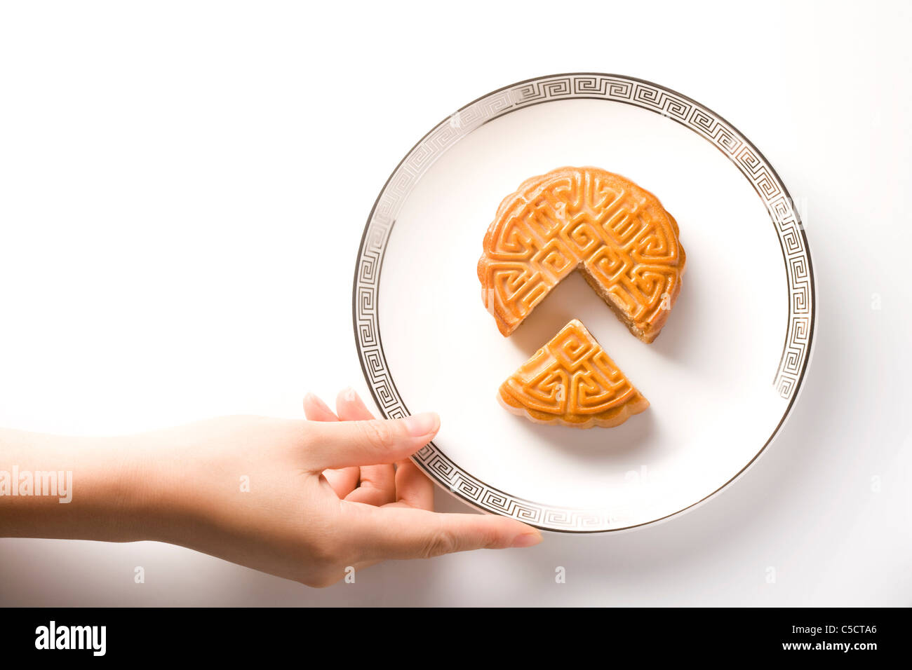 Mid-Autumn Festival Moon Cake, Cut and Presented on Plate Stock Photo ...
