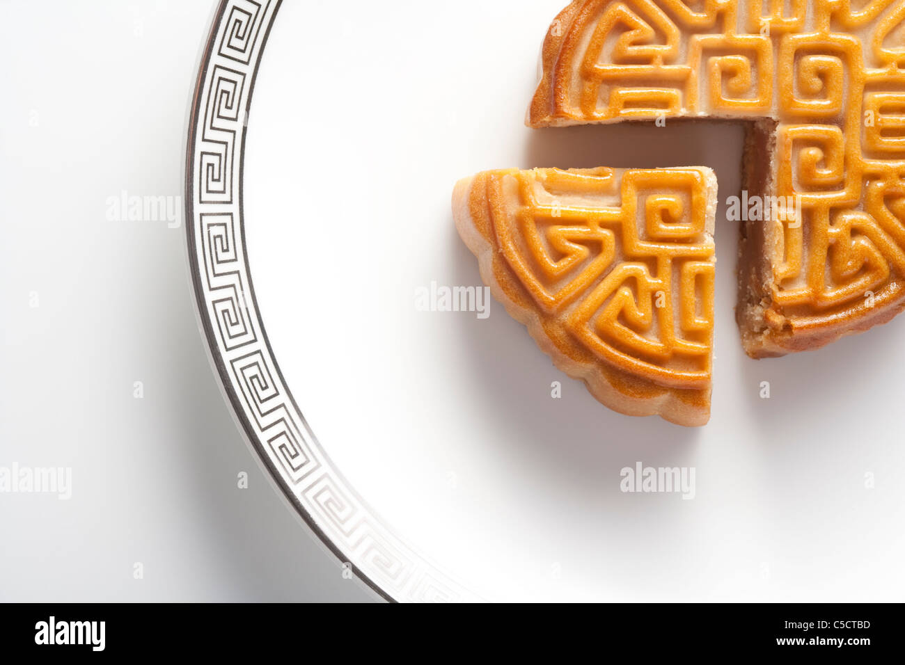 Mid-Autumn Festival Moon Cake, Cut and Presented on Plate Stock Photo ...