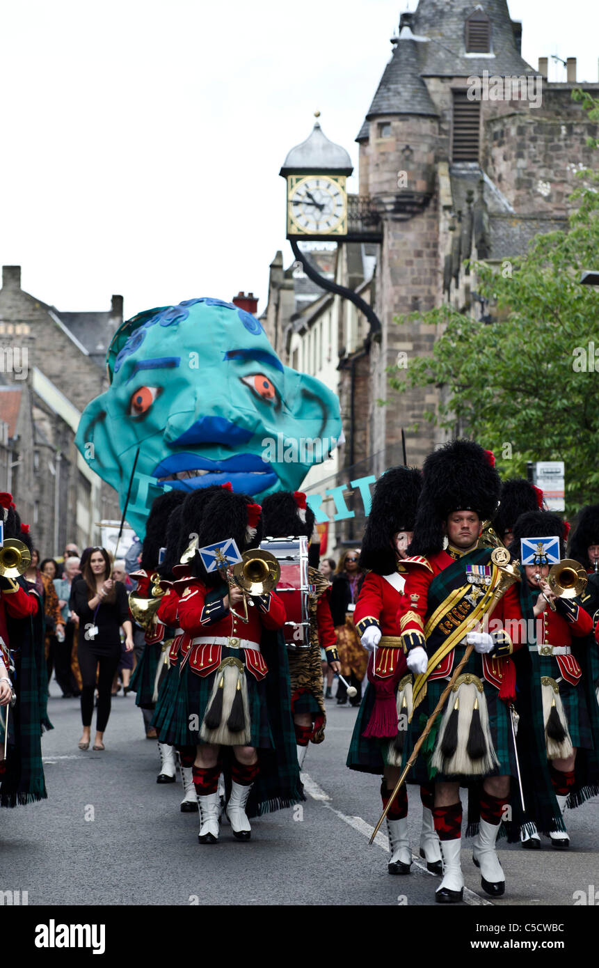 Parade down Edinburgh's Royal Mile to celebrate the Queen opening a ...