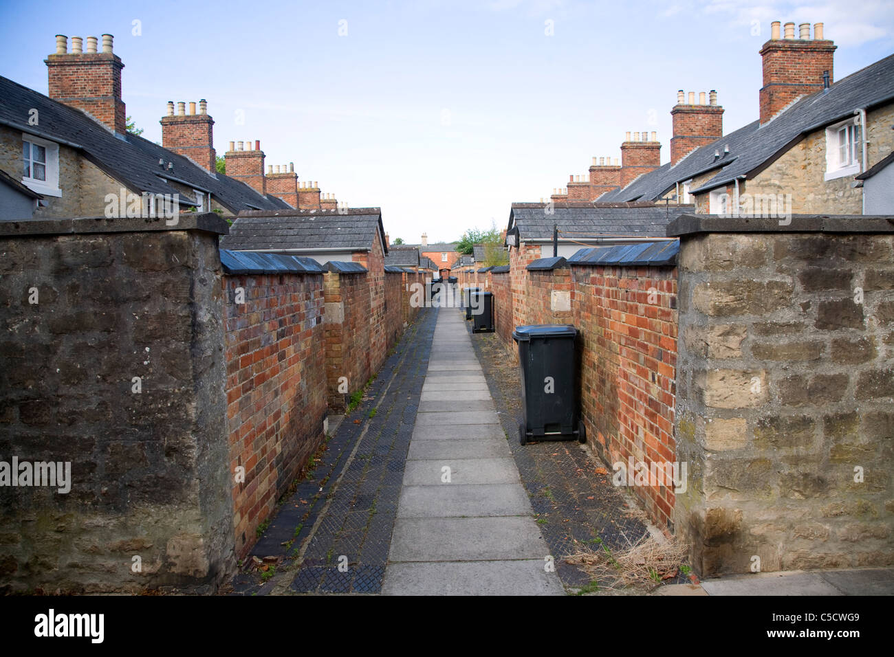 Rubbish bins in back alley hi-res stock photography and images - Alamy