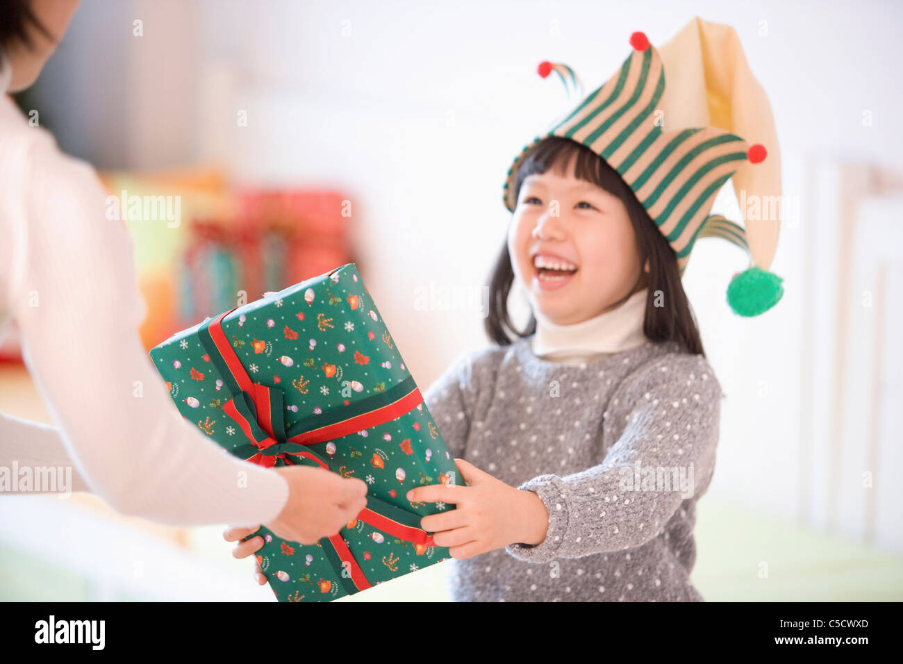 girl got present Stock Photo - Alamy