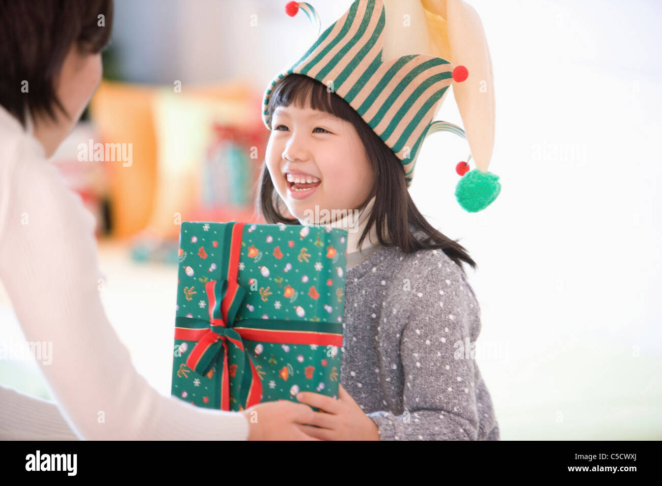 girl got present Stock Photo - Alamy