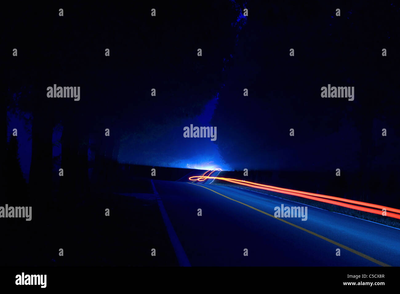 light in night road Stock Photo - Alamy