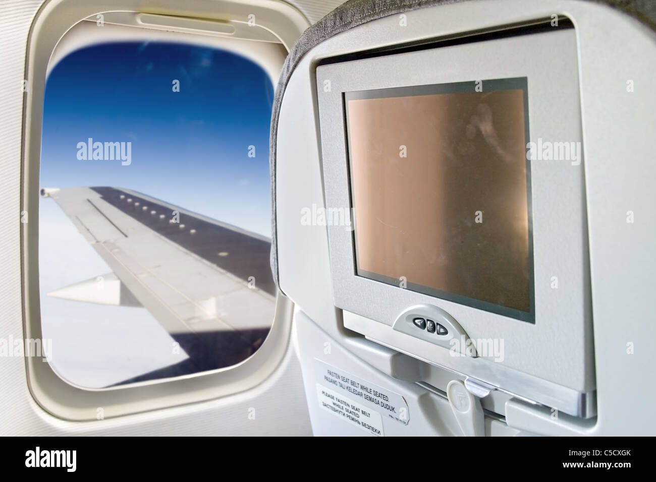 Monitor and a window on the plane Stock Photo - Alamy