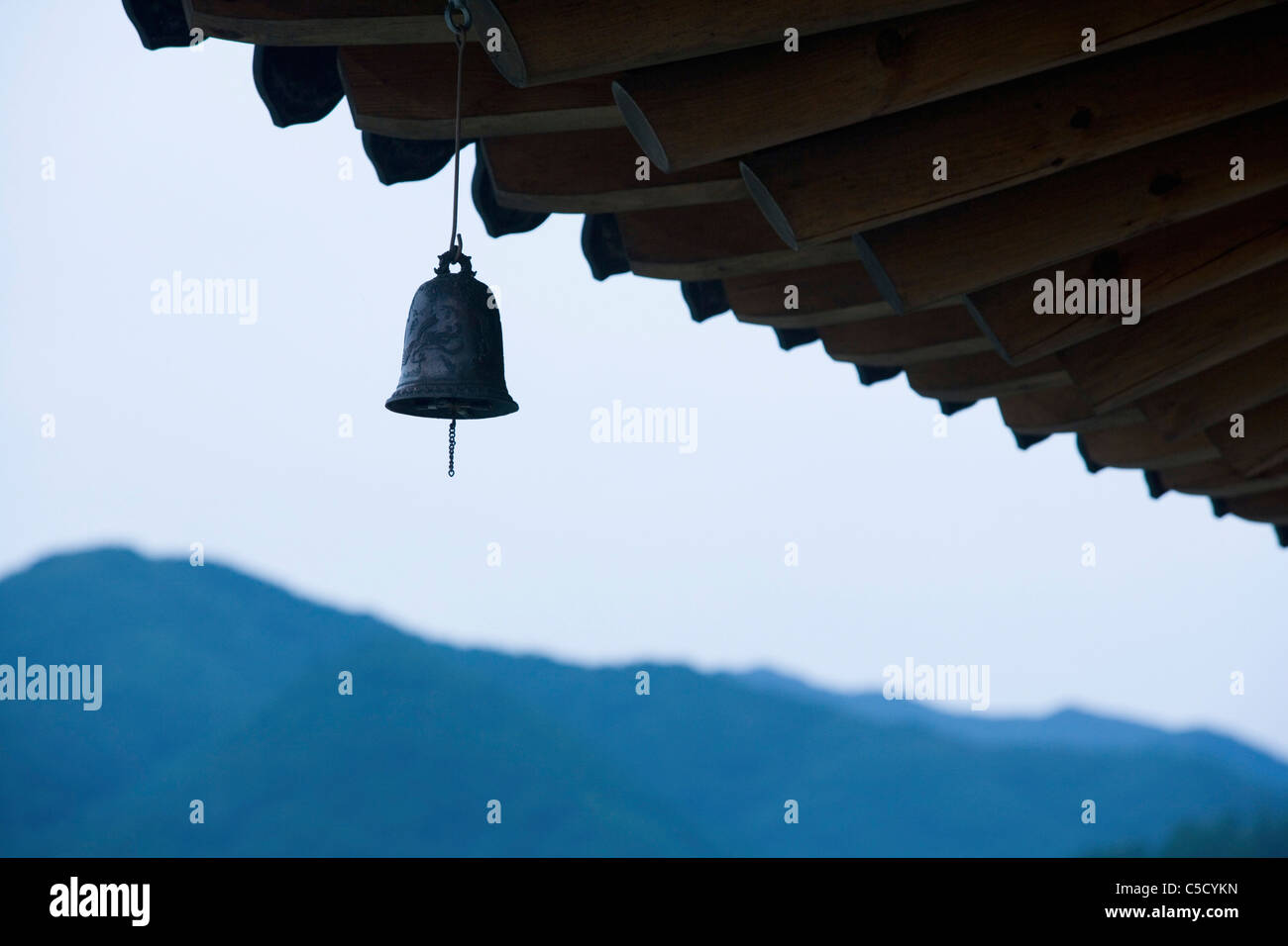 wind bell haning under the eaves Stock Photo - Alamy