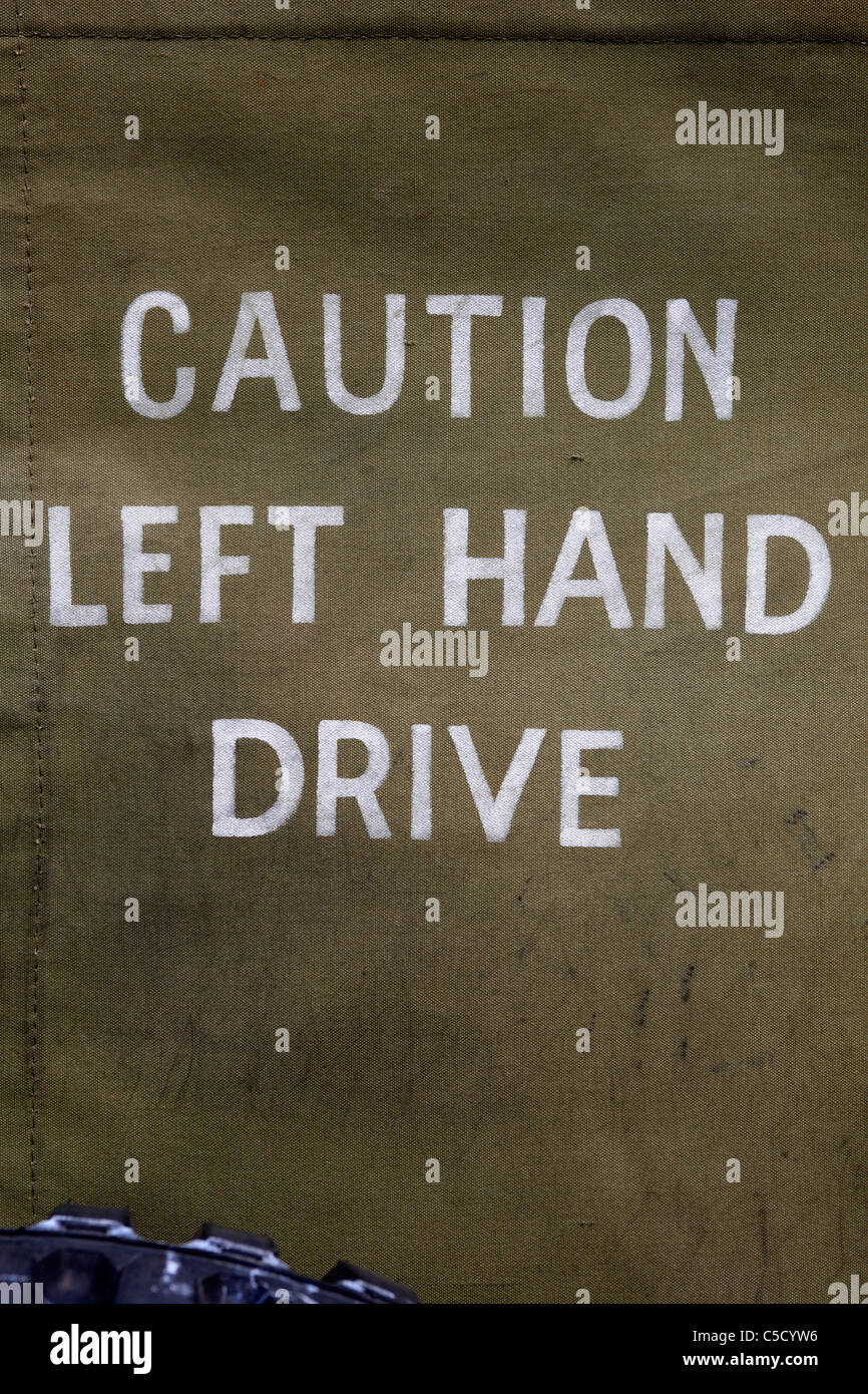Caution Left Hand Drive Sign on the bck of a US Army Vehicle Stock ...