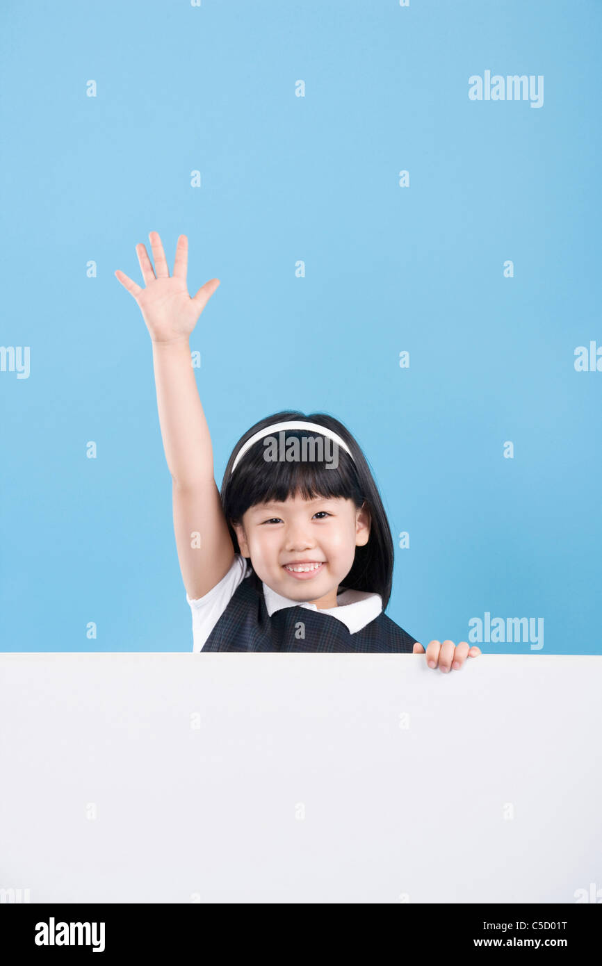 girl raising her hands Stock Photo - Alamy