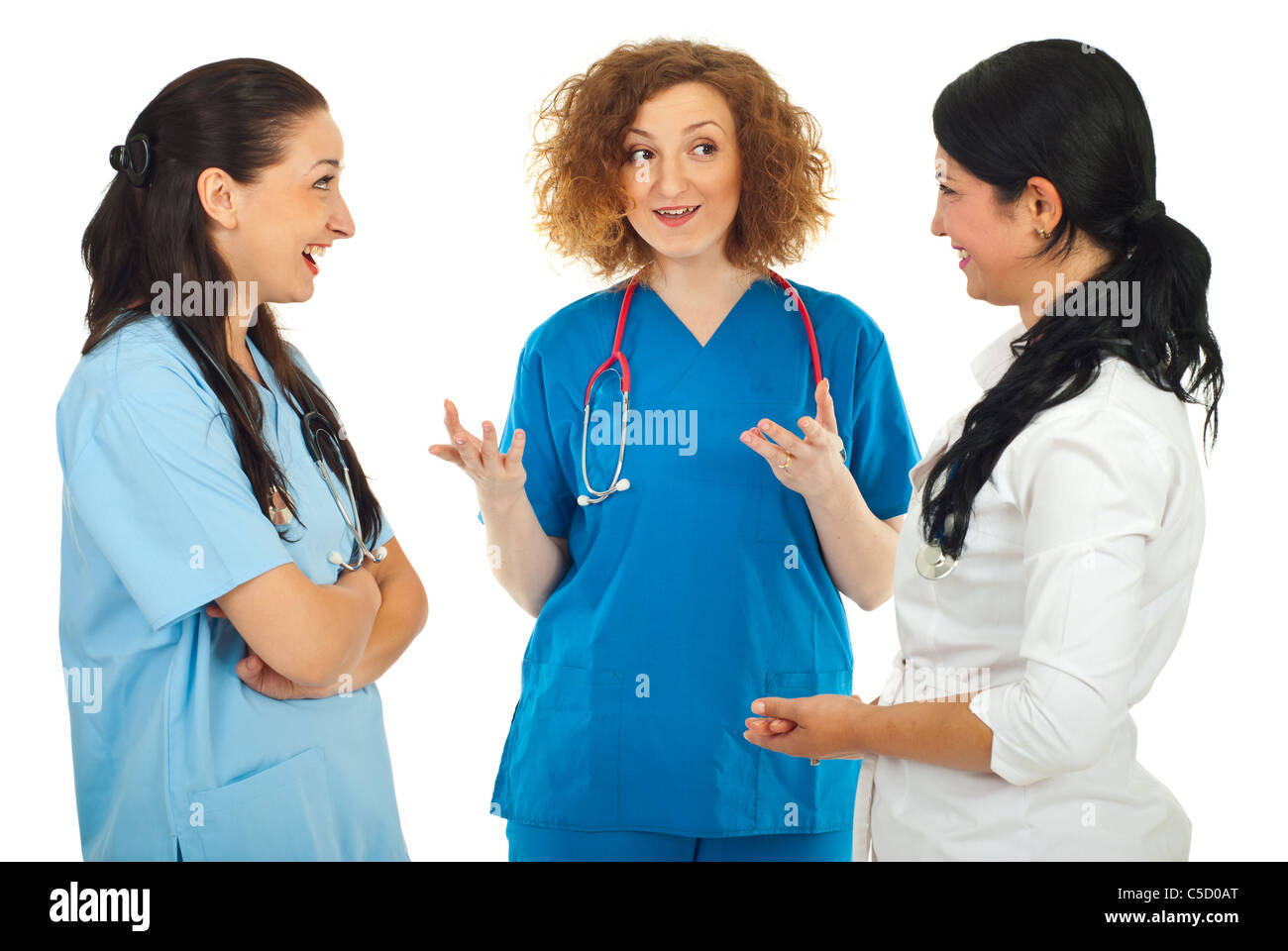 Three doctors women having happy conversation isolated on white ...