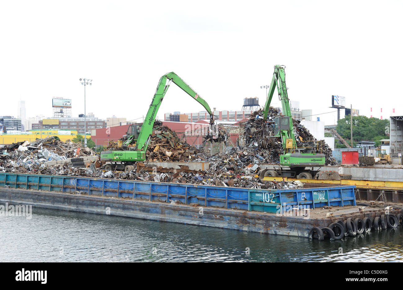 Sims Metal recycles scrap metal on Newtown Creek, a 3.8-mile-long ...
