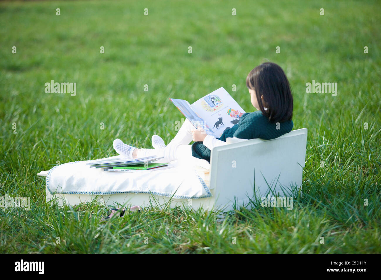 Woman on sofa in field hi-res stock photography and images - Alamy