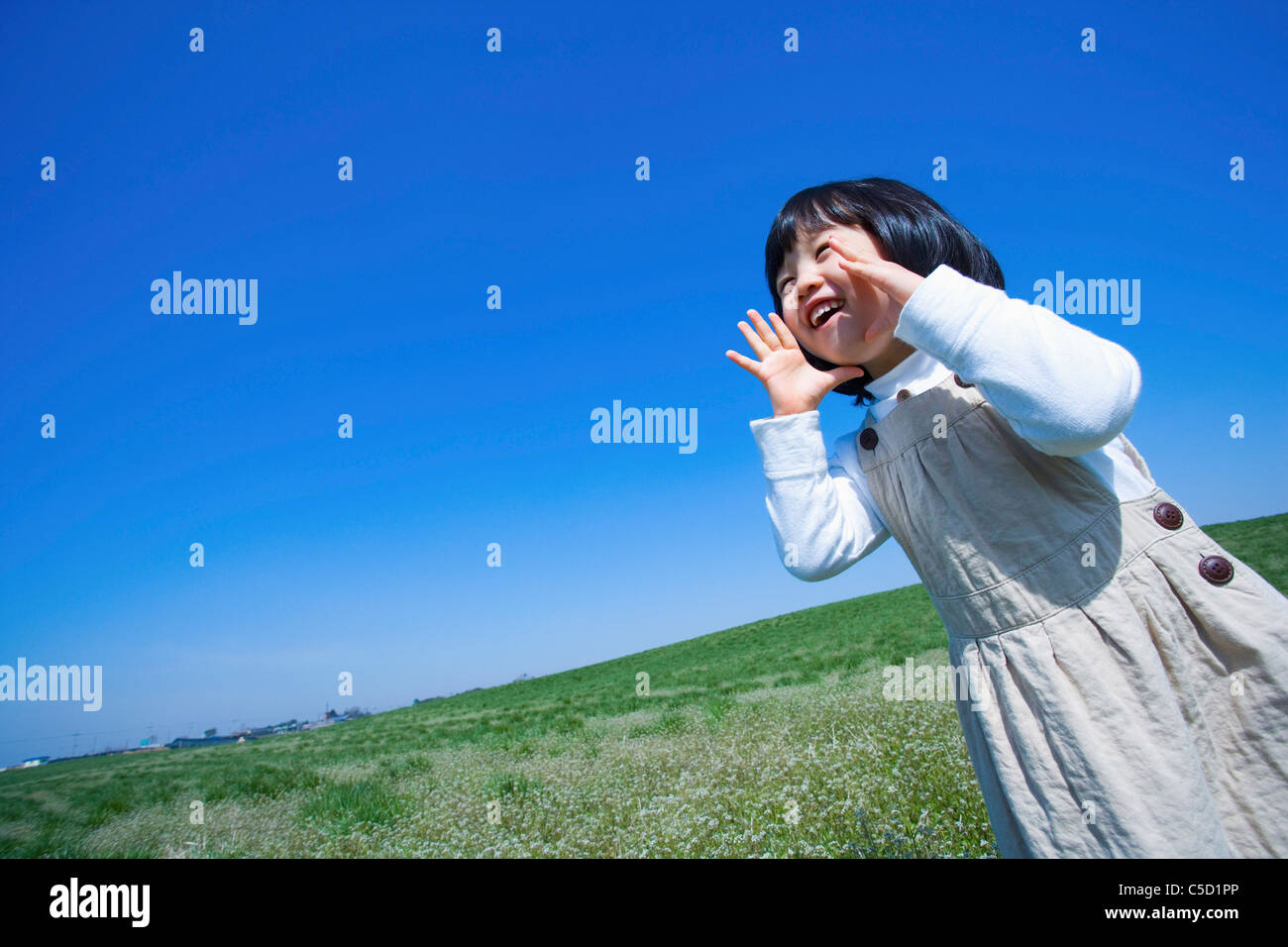 girl shouting in the flower field Stock Photo - Alamy