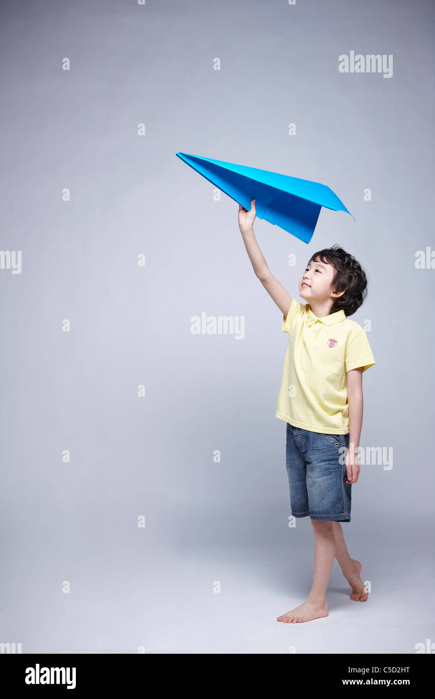 Flying paper plane hi-res stock photography and images - Alamy