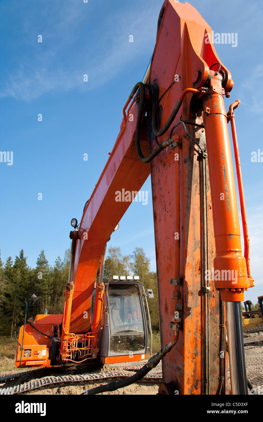 Blue excavator hi-res stock photography and images - Alamy