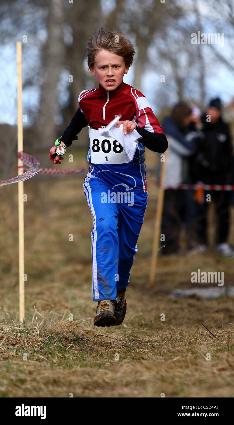 Child running finish line hi-res stock photography and images - Alamy